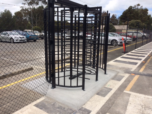 Dual full height turnstile with looped bars | Leda Security Products