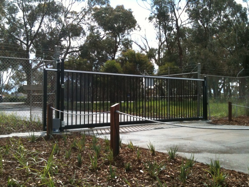 Industrial full height track gate | Leda Security Products